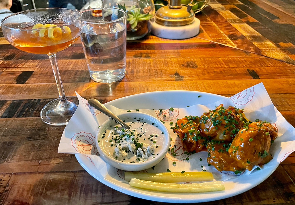 Crab Rangoon nachos and hickory-smoked chicken wings at Longfellow Bar ...