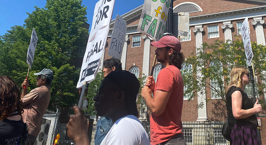 Small protest marks six months after killing; three groups maintain ...