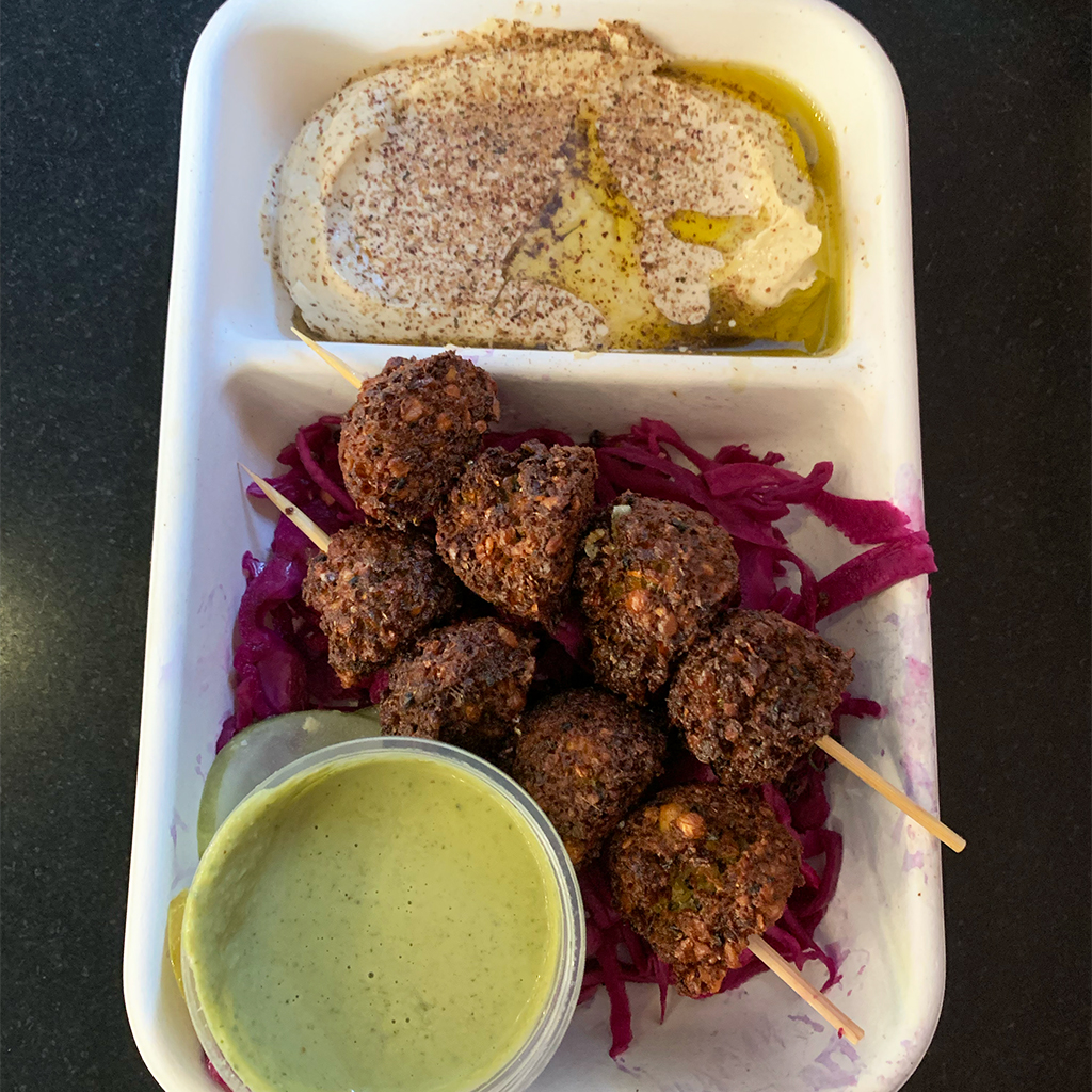 Clover’s falafel skewers with hummus and spicy green tahini - Cambridge Day