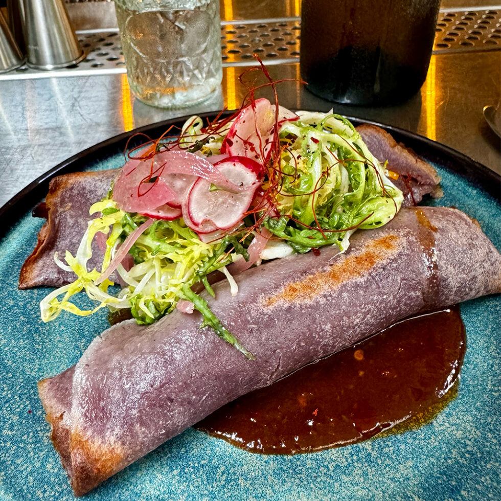 Duck crepes in an airy patio - Cambridge Day