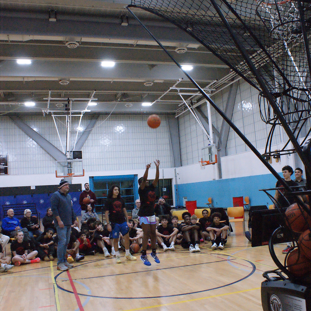 Is it the hoop? Shooting machine gives bounce to basketball program ...